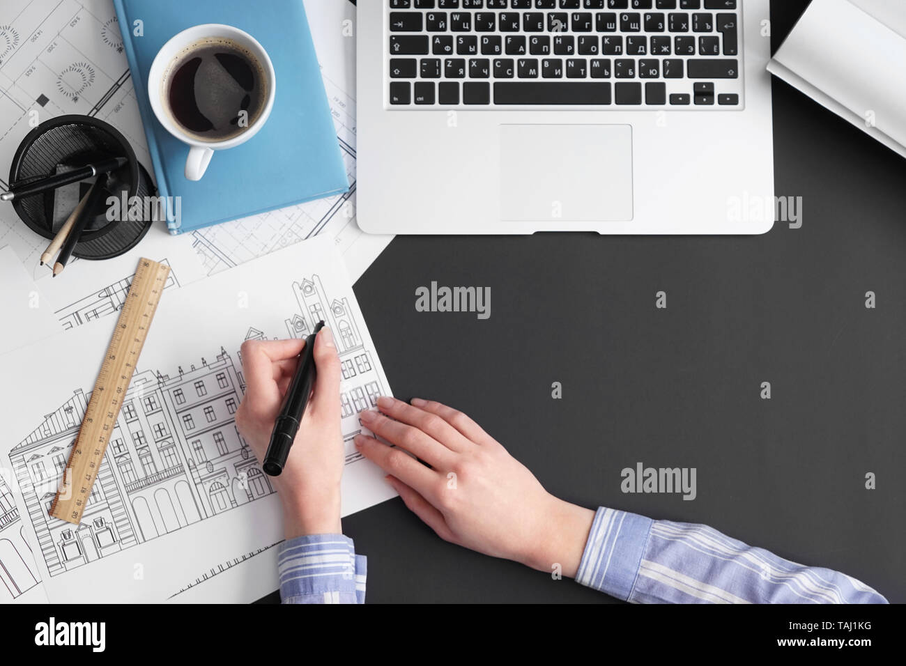 Female engineer working on dark background Stock Photo - Alamy