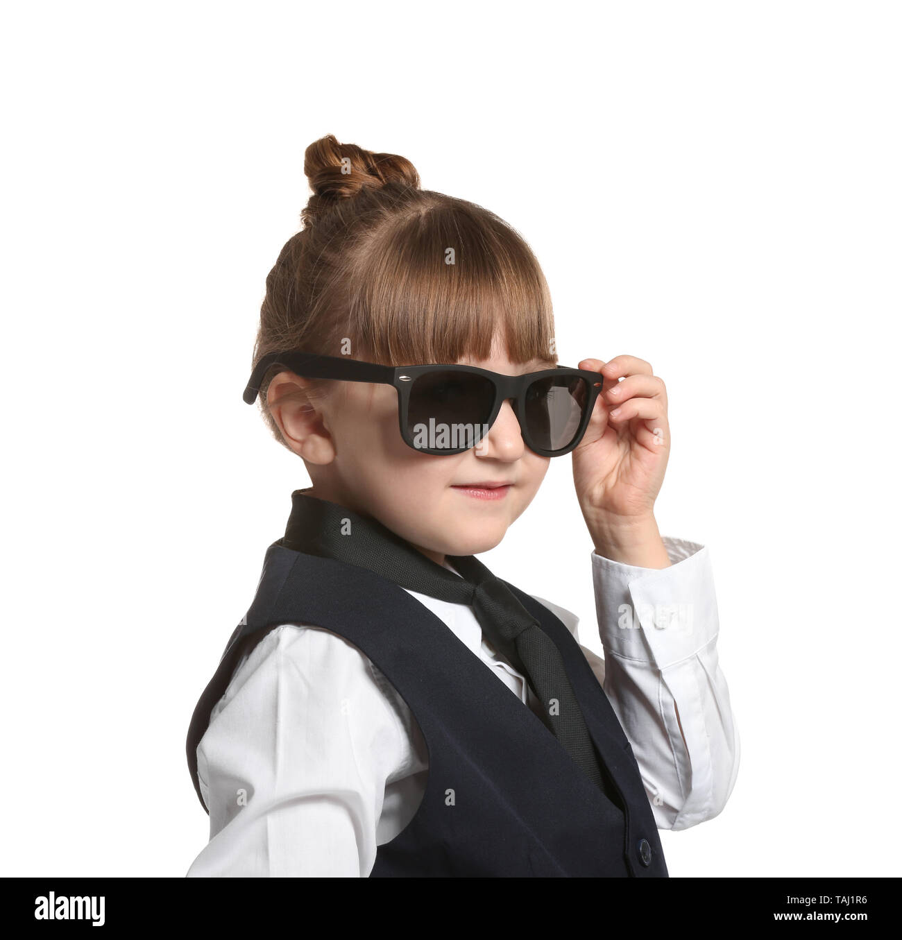 Portrait of cute little security guard on white background Stock Photo ...