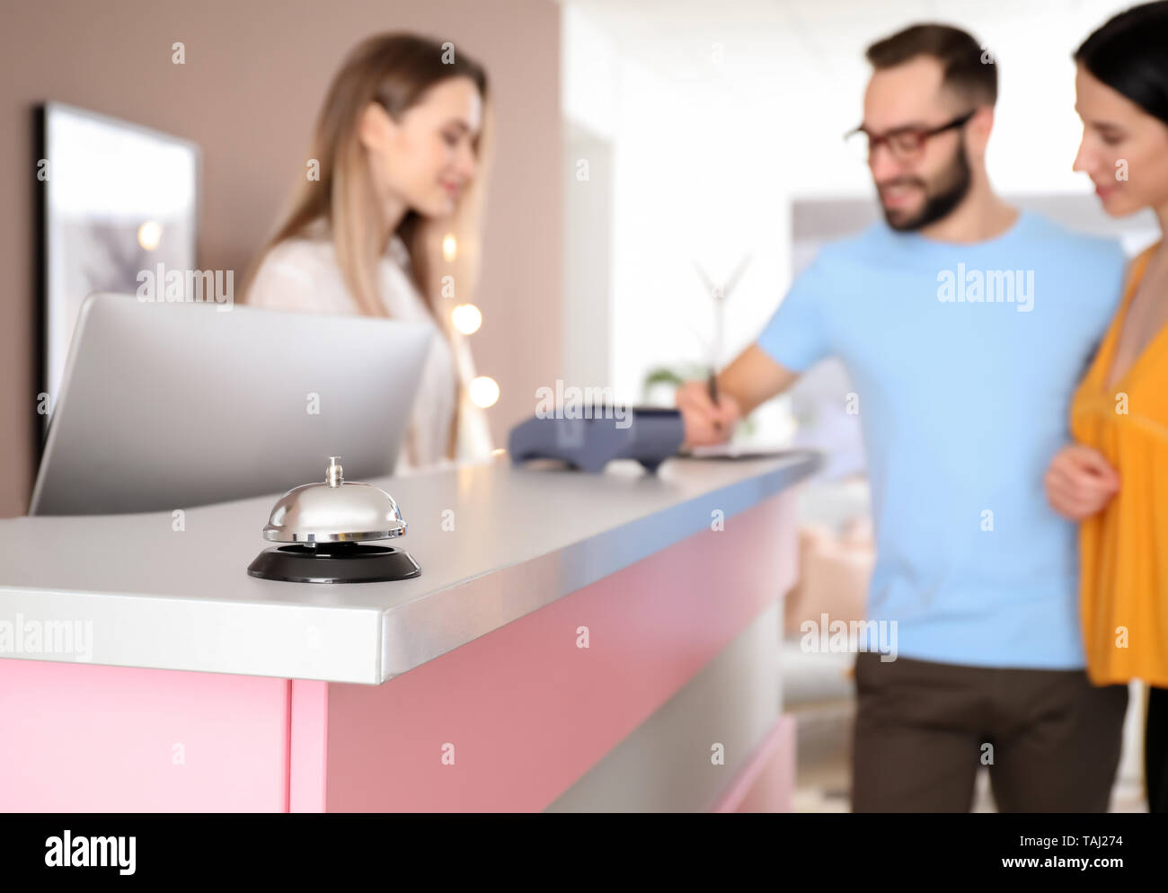 Hotel reception background staff hi-res stock photography and images ...