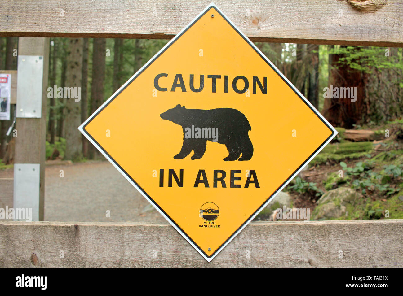 Caution Bear in Area warning sign Stock Photo - Alamy
