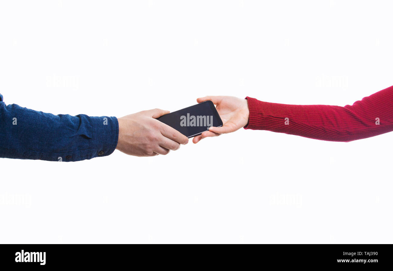 Man hand giving woman mobile phone present. Image of mobile phone gift ...