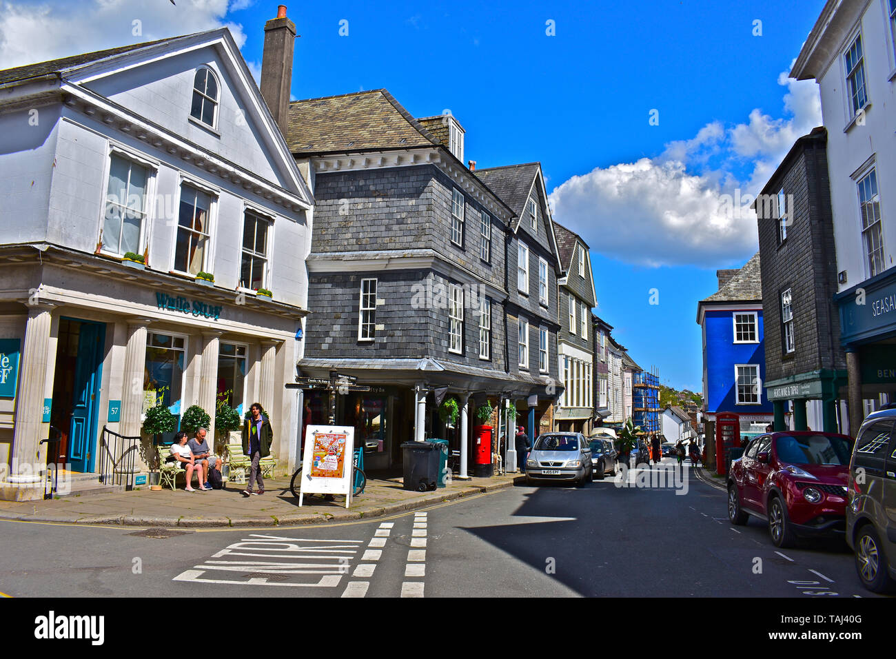 A view of the High Street in central Totnes at the junction with Castle ...