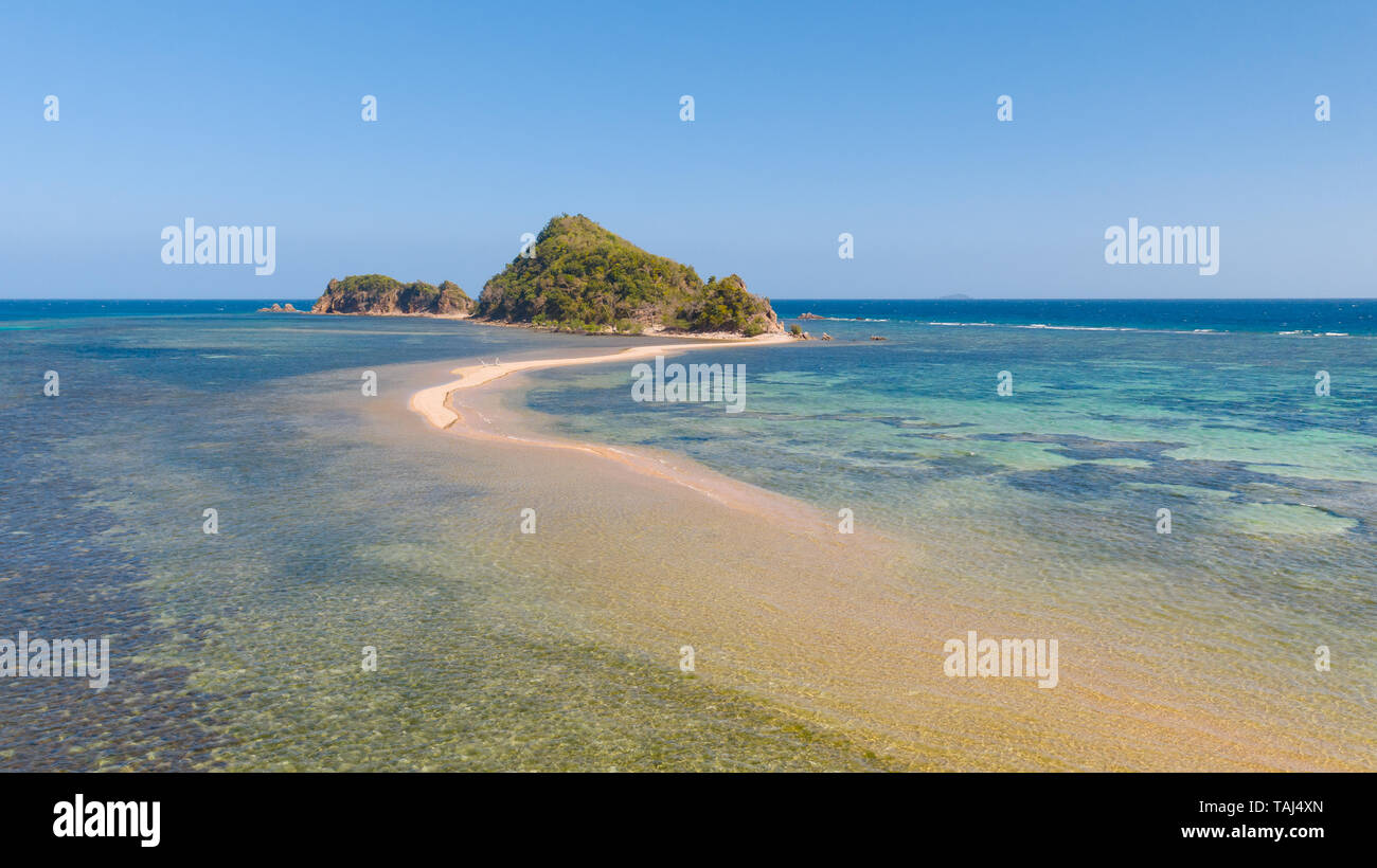SmSmall islands with a sand bar. Coral reefs and blue lagoons. islands ...