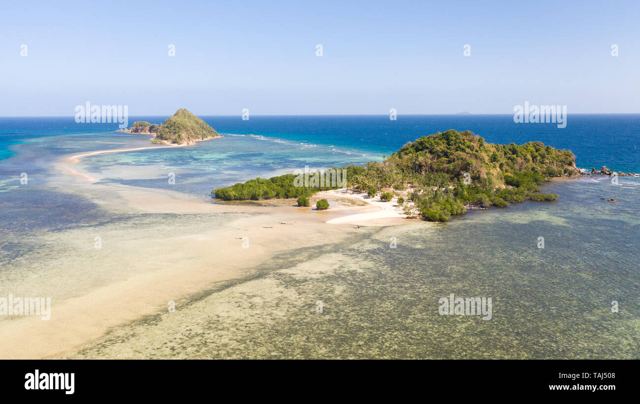 SmSmall islands with a sand bar. Coral reefs and blue lagoons. islands ...