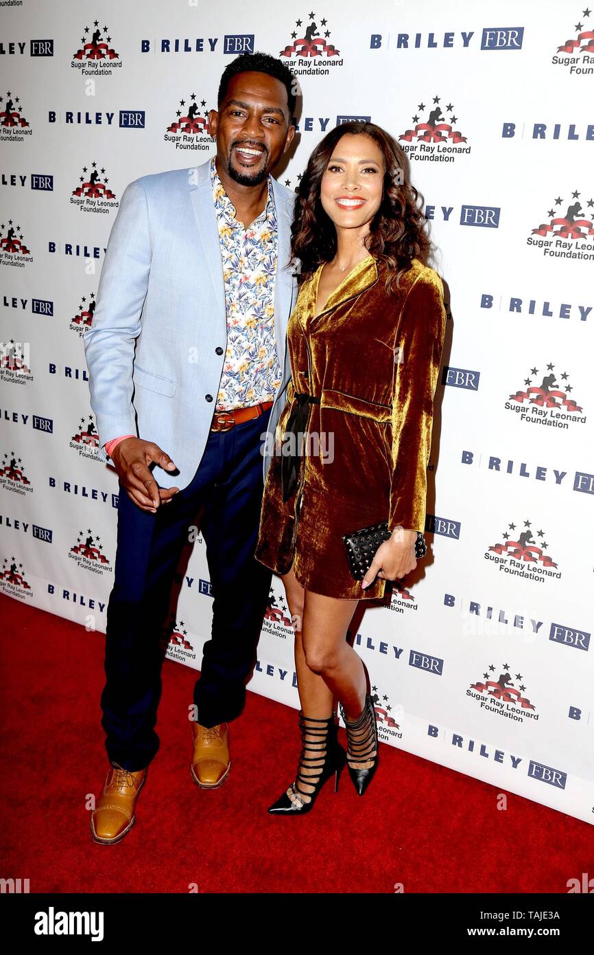 Beverly Hills, CA. 22nd May, 2019. Bill Bellamy, Kristen Baker Bellamy ...