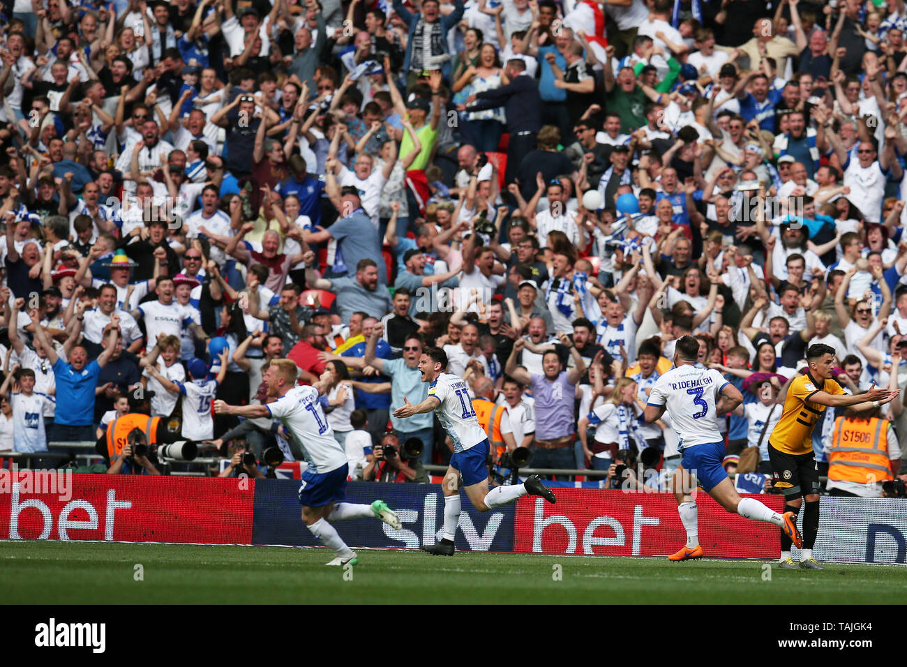 London, UK. 25th May, 2019. Connor Jenkins of Tranmere Rovers (centre ...