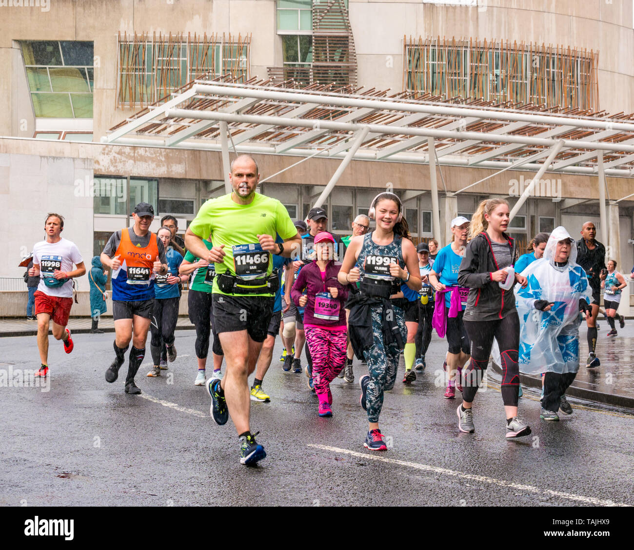 Rainy day runners hi-res stock photography and images - Alamy