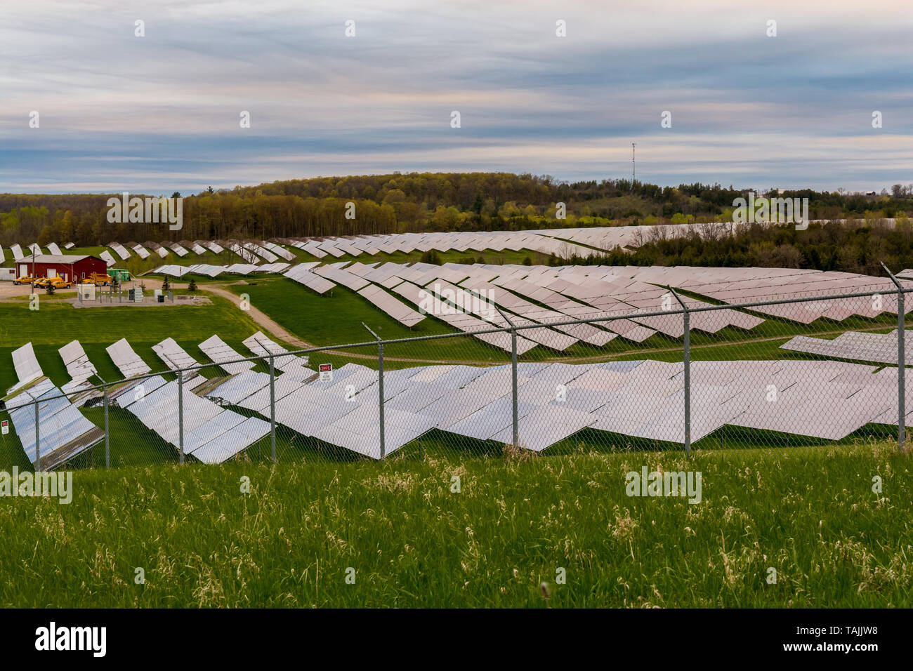 Solar farm featuring array of several solar panels Stock Photo - Alamy