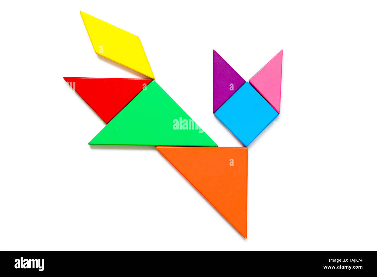 Color wood tangram puzzle in cat shape on white background Stock Photo ...
