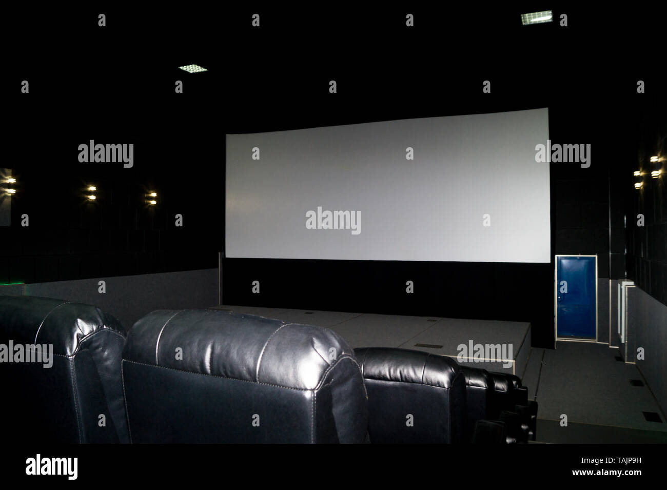 The interior of a modern cinema hall for watching movie, show and ...