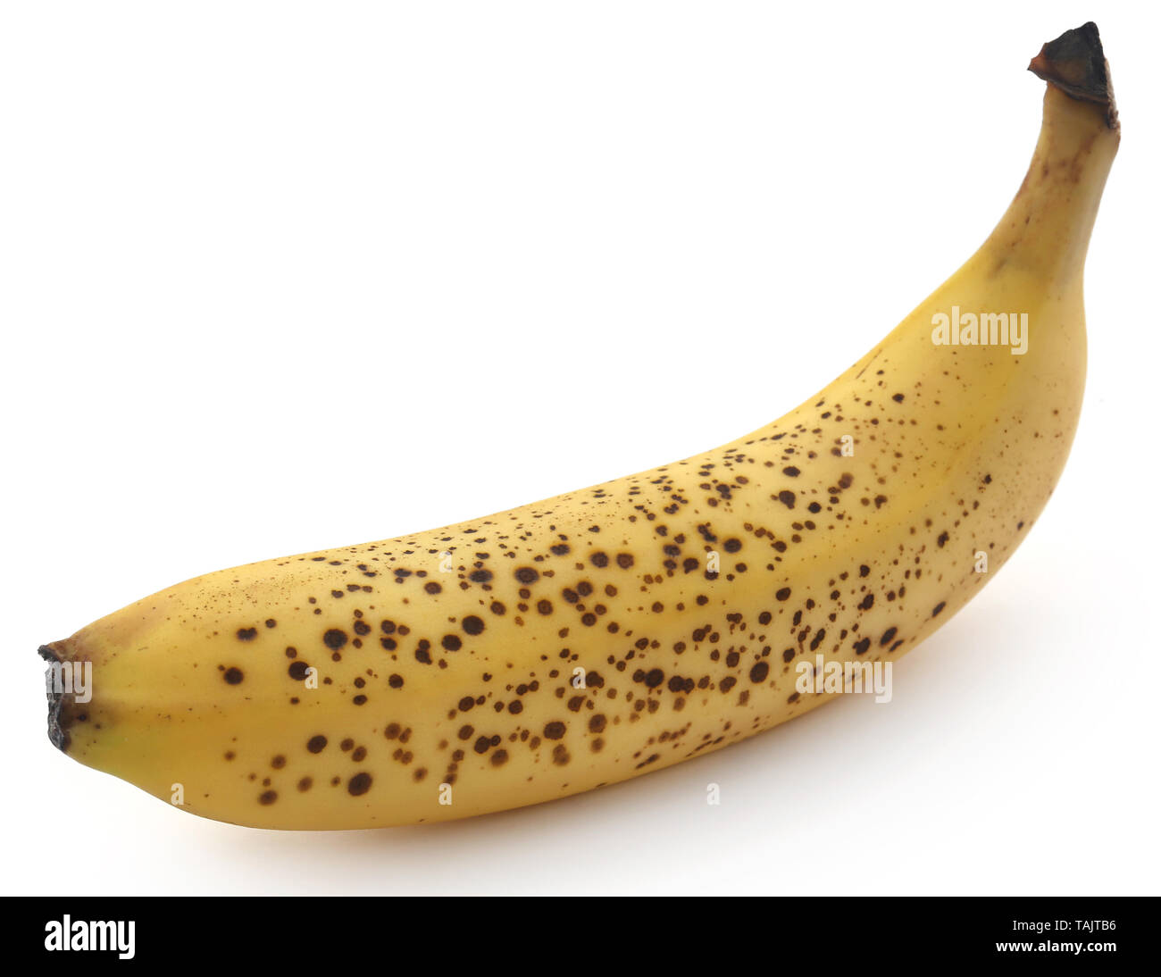 Spotted banana over white background Stock Photo - Alamy