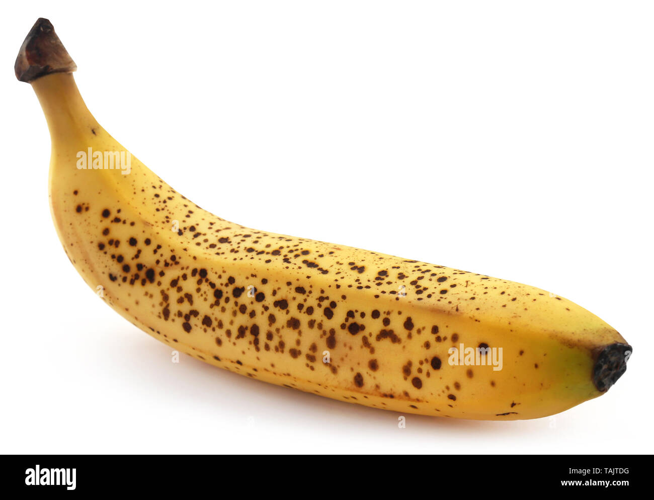 Spotted banana over white background Stock Photo - Alamy