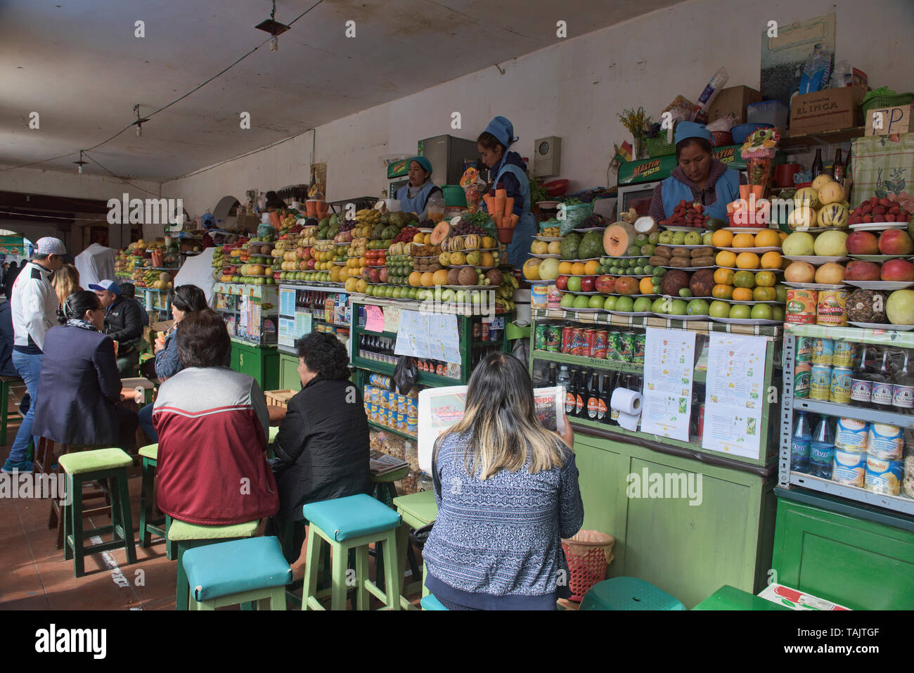 Colorful fruit shake vendors at the Mercado Central, Sucre, Bolivia ...