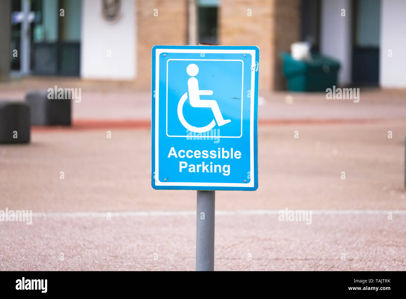 Accessible parking sign at school for disabled drivers Stock Photo - Alamy