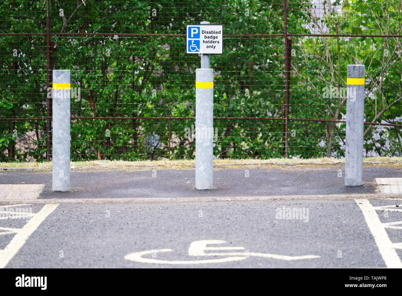 Accessible parking space for disabled driver sign Stock Photo - Alamy