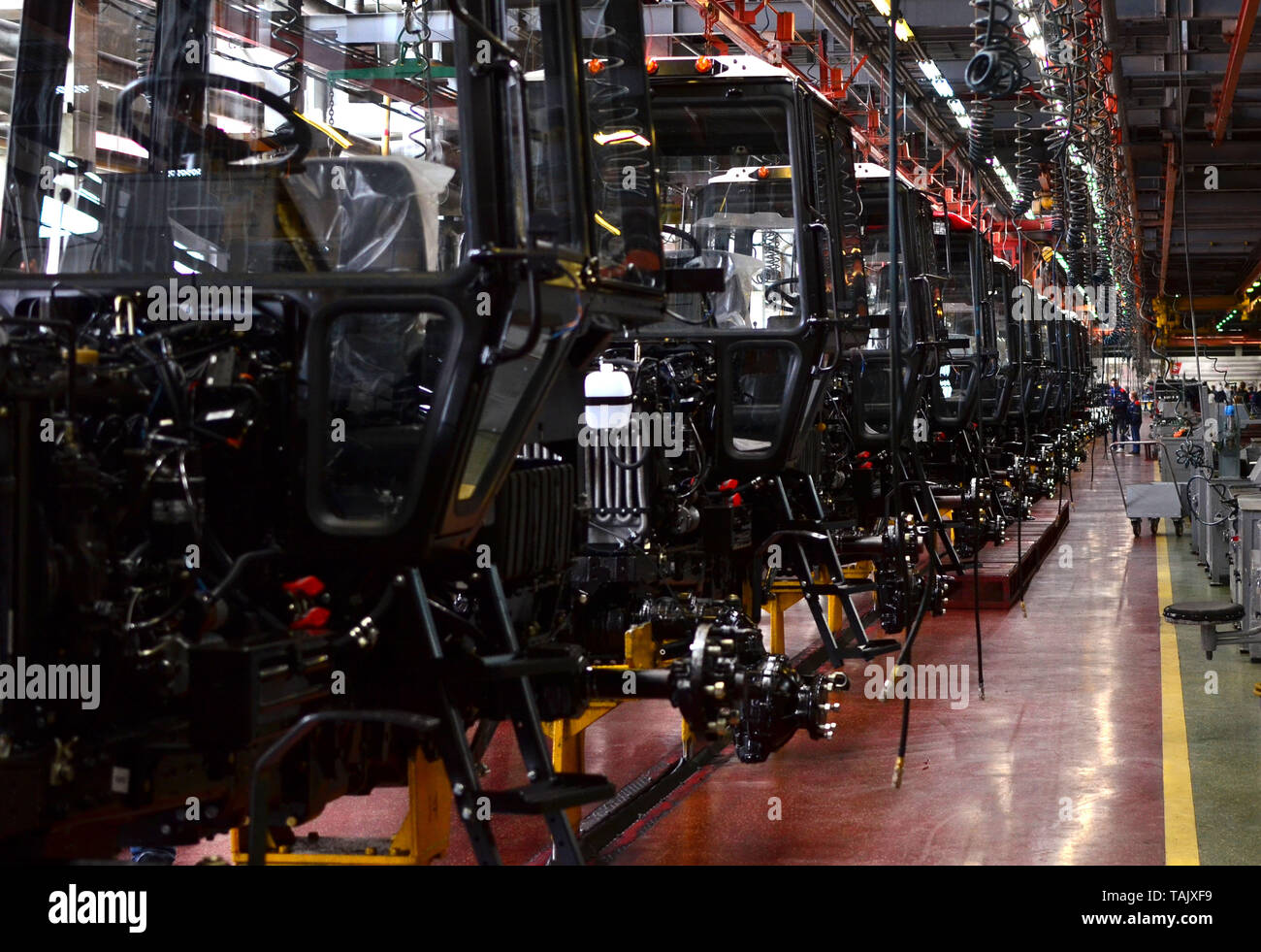 Tractor Manufacture work. Assembly line inside the agricultural ...