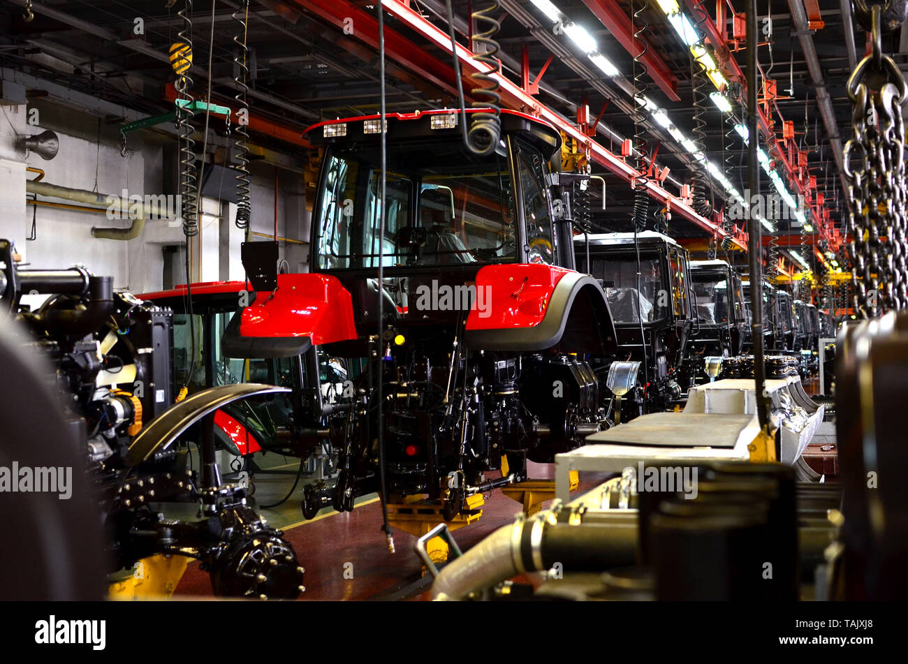 Tractor Manufacture work. Assembly line inside the agricultural ...
