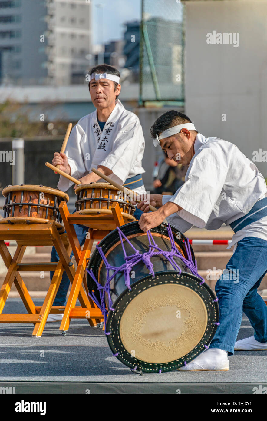 Traditional Taiko drummer performing at a local competition in Tokyo ...