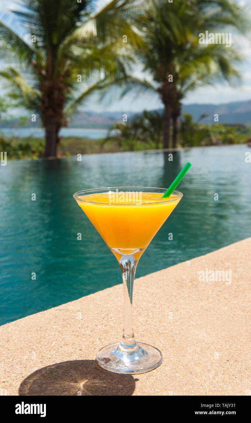 Mango daiquiri by the pool in the Costa Rican summer sunshine Stock ...