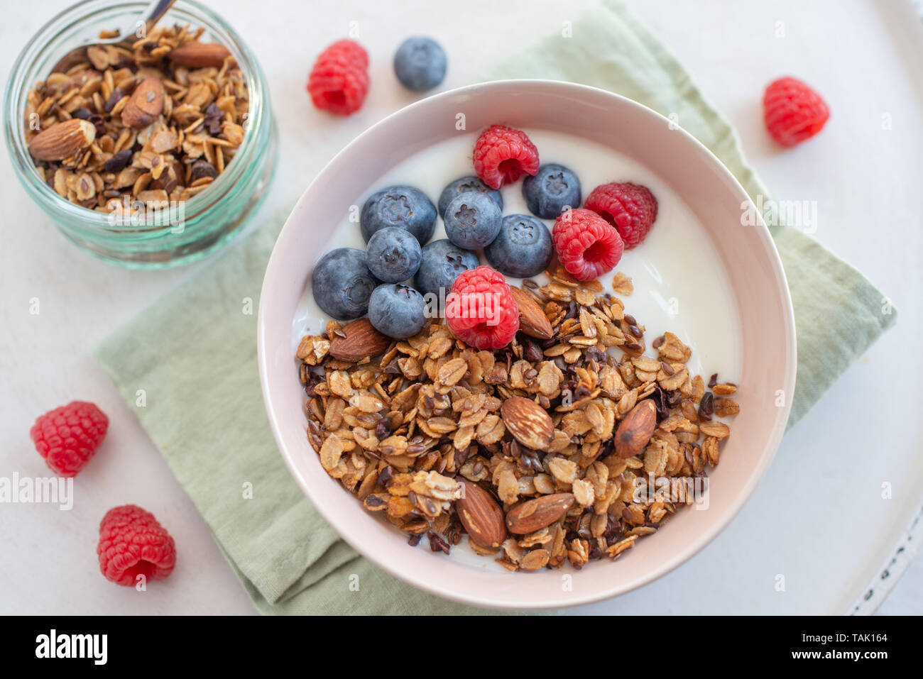 Yogurt with home made granola and berries Stock Photo - Alamy