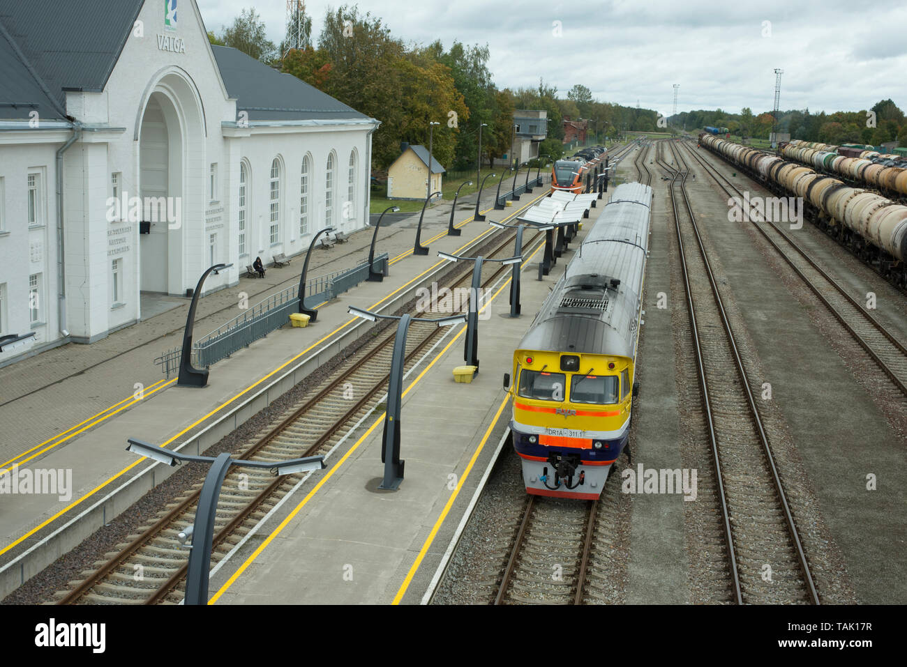 Valga Station on the border. The orange train is the Estonian (Elron ...
