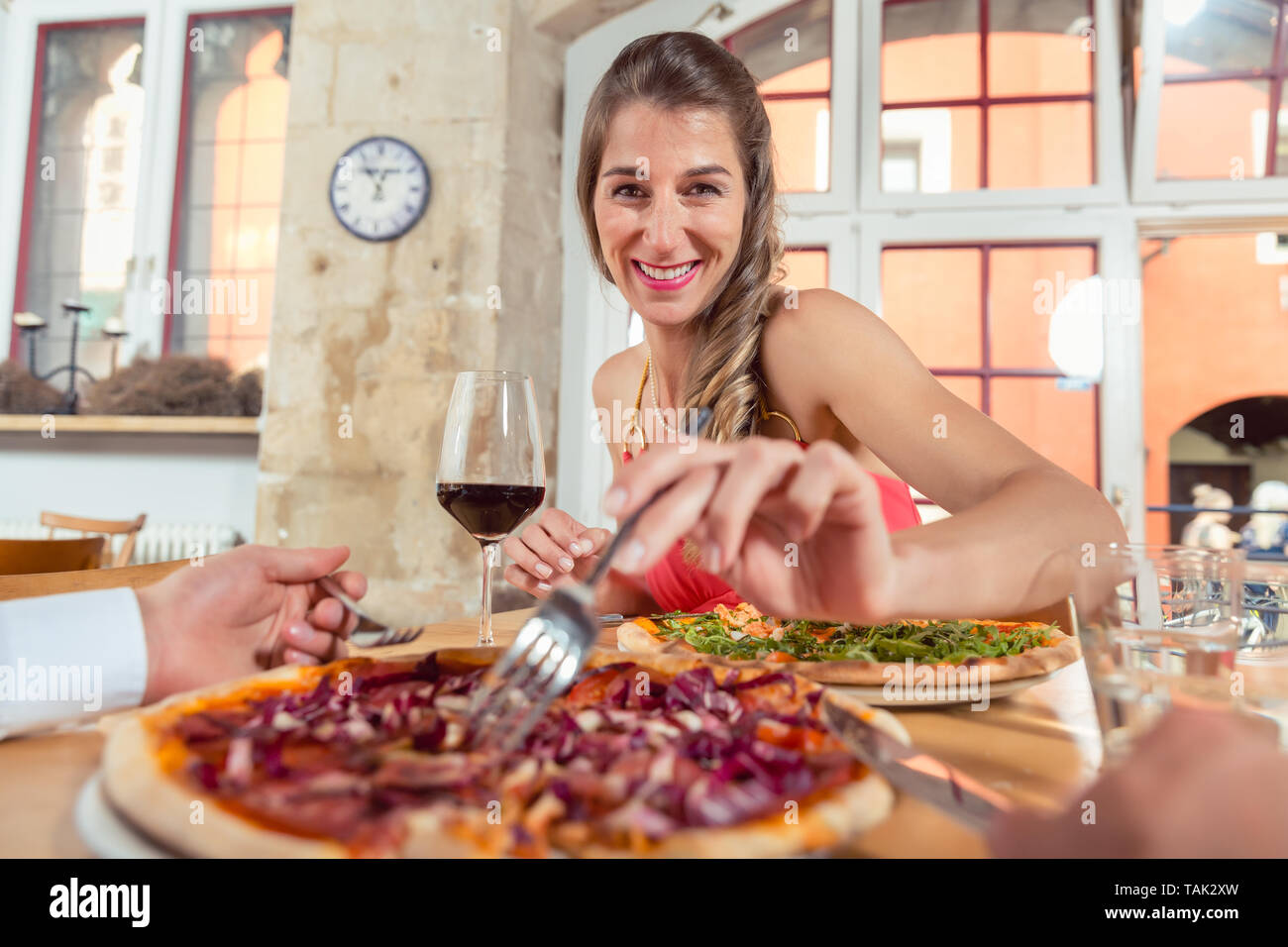 Husband and wife eating pizza hi-res stock photography and images - Alamy