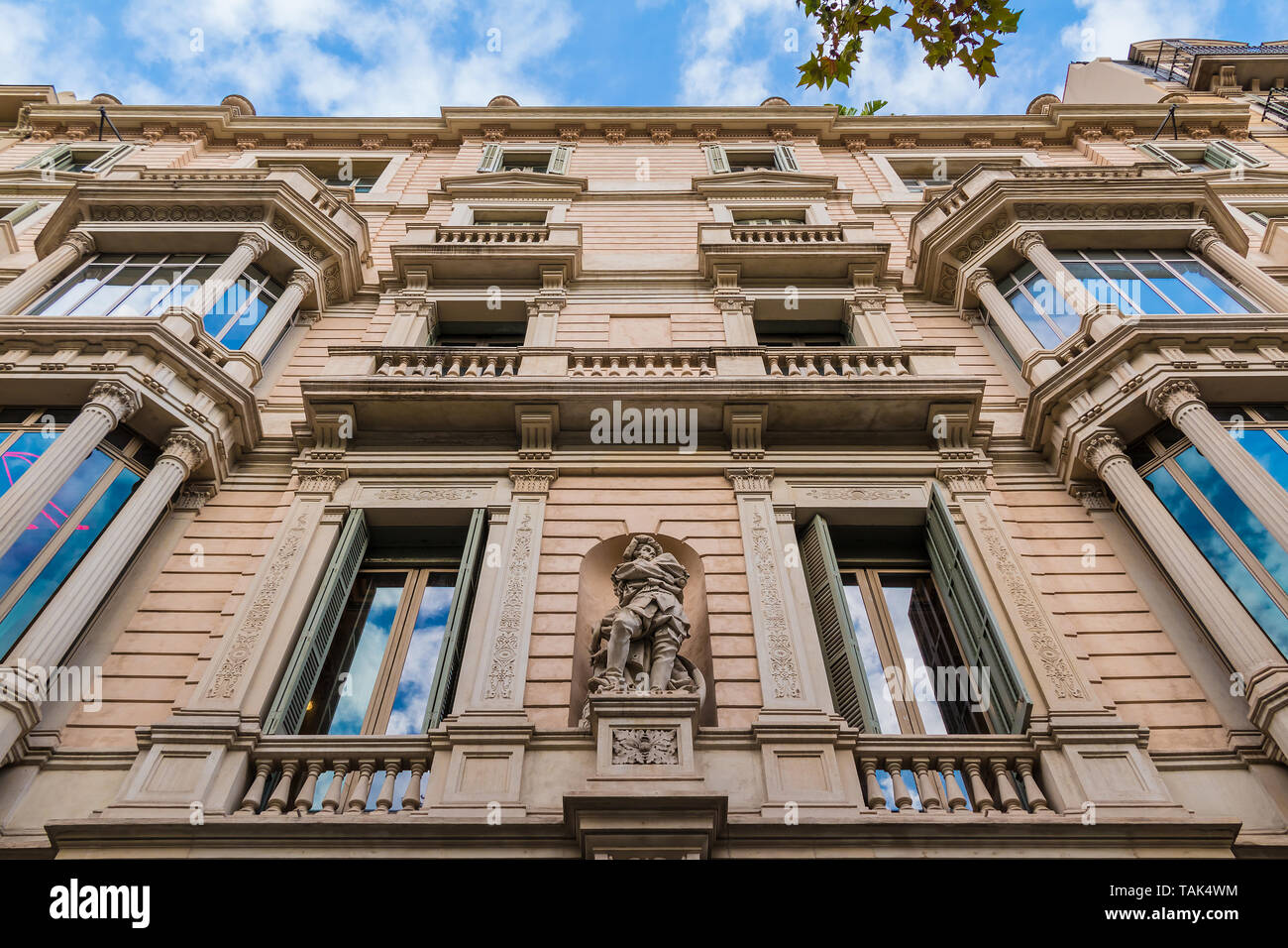 Worm's-eye view of a historic urban building on the Passeig de Gracia ...