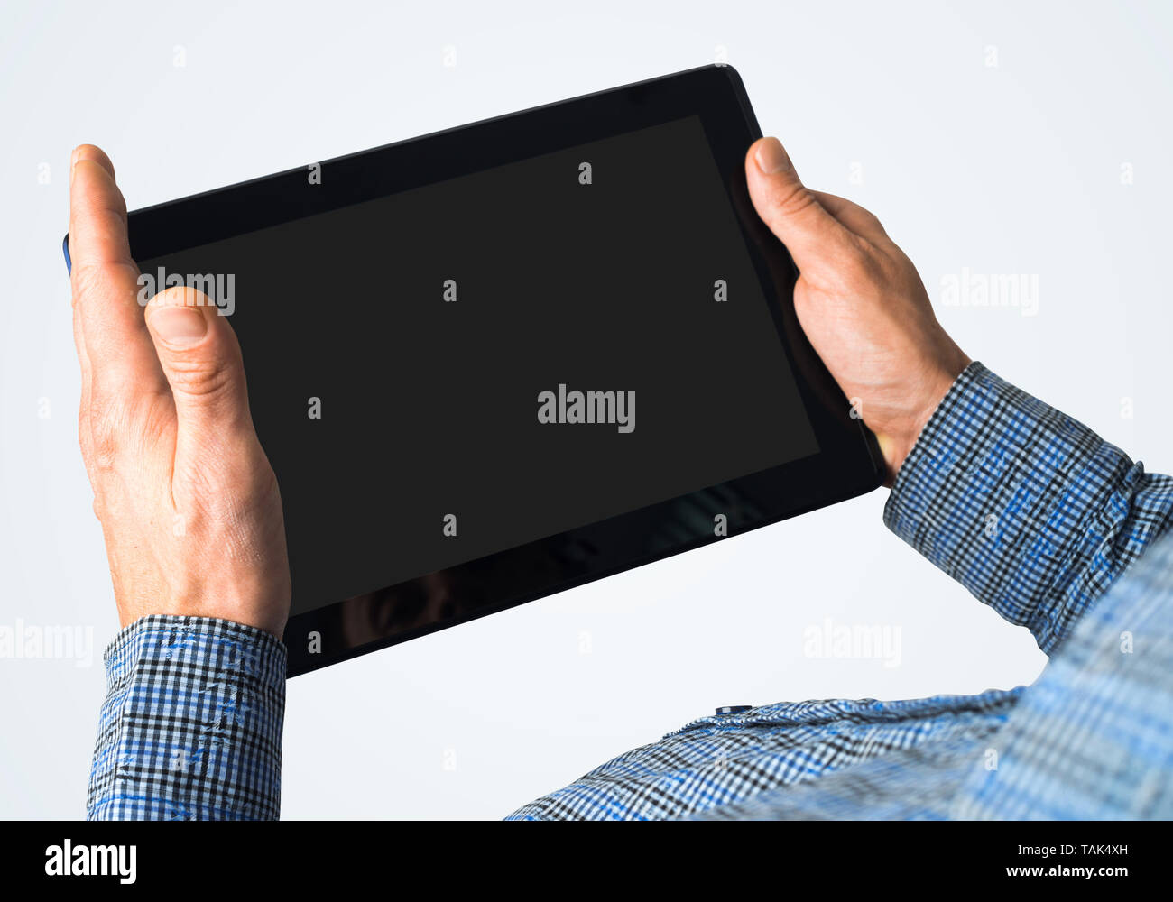 Hands of businessman holding tablet pc with black screen Stock Photo ...