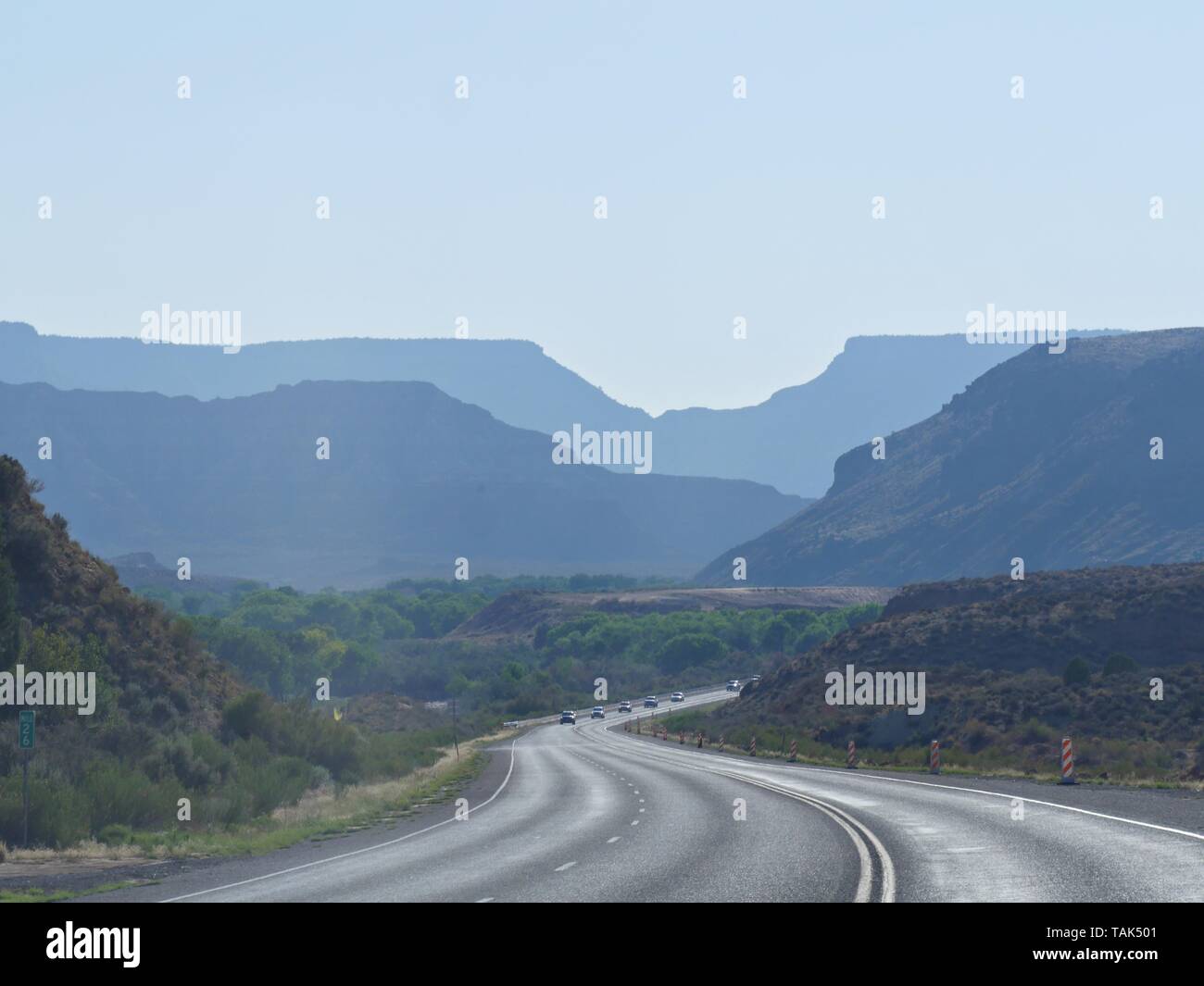 Virgin, Utah--July 2018: Winding road with cars traveling. In the ...