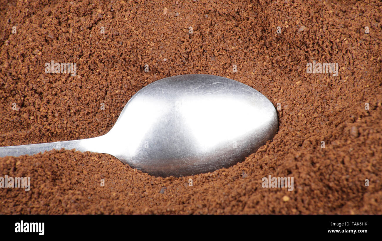 milled coffee and one teaspoon Stock Photo - Alamy