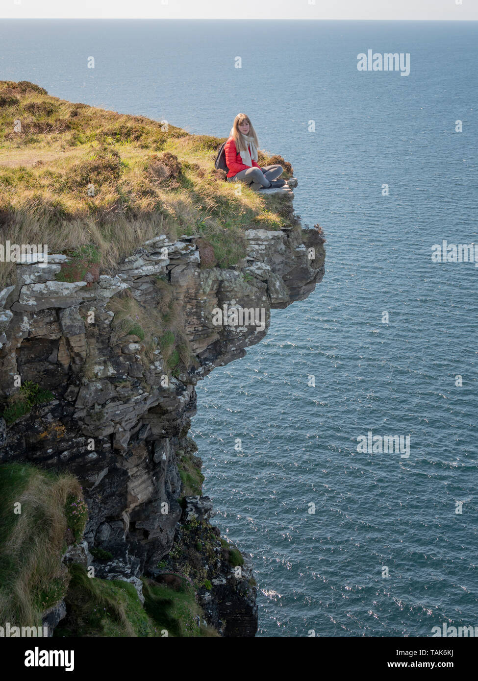 Woman cliff ocean storm hi-res stock photography and images - Alamy