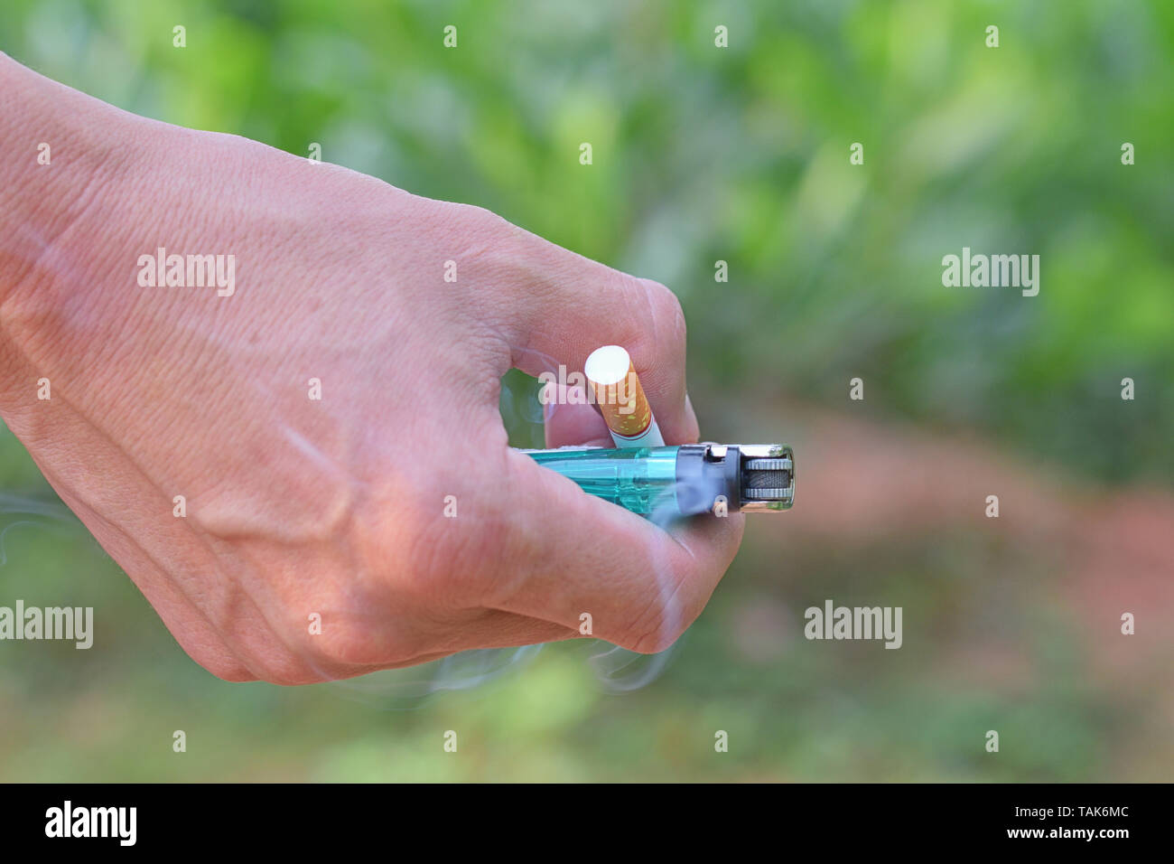 Hand holding smoke hi-res stock photography and images - Alamy