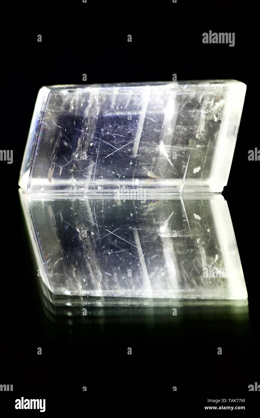Icelandic Spar Calcite Crystal on a Shiny Black Background. Macro ...