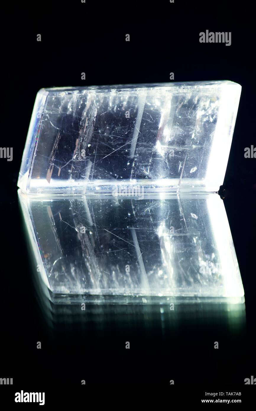 Icelandic Spar Calcite Crystal on a Shiny Black Background. Macro ...