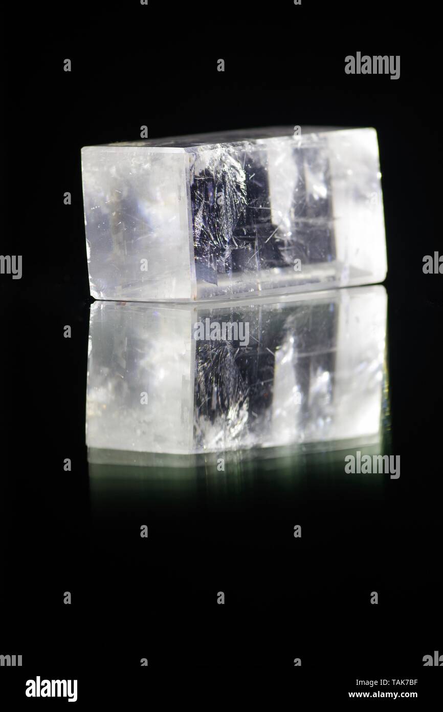 Icelandic Spar Calcite Crystal on a Shiny Black Background. Macro ...
