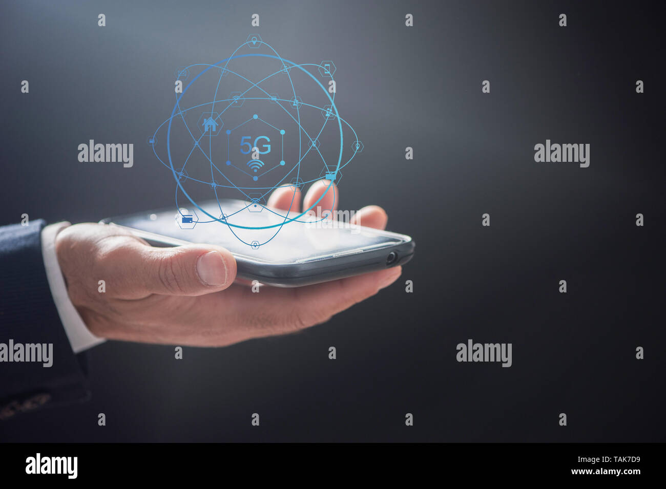 Business man using mobile smartphone with 5G icons flow on virtual ...