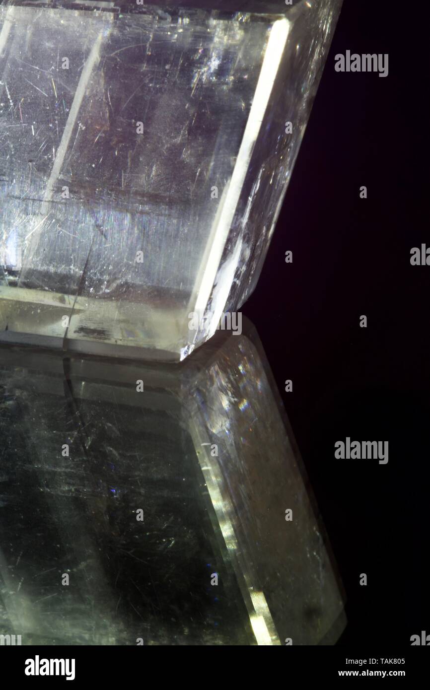 Icelandic Spar Calcite Crystal on a Shiny Black Background. Macro ...