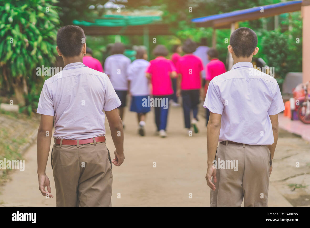 Students talking behind student hi-res stock photography and images - Alamy