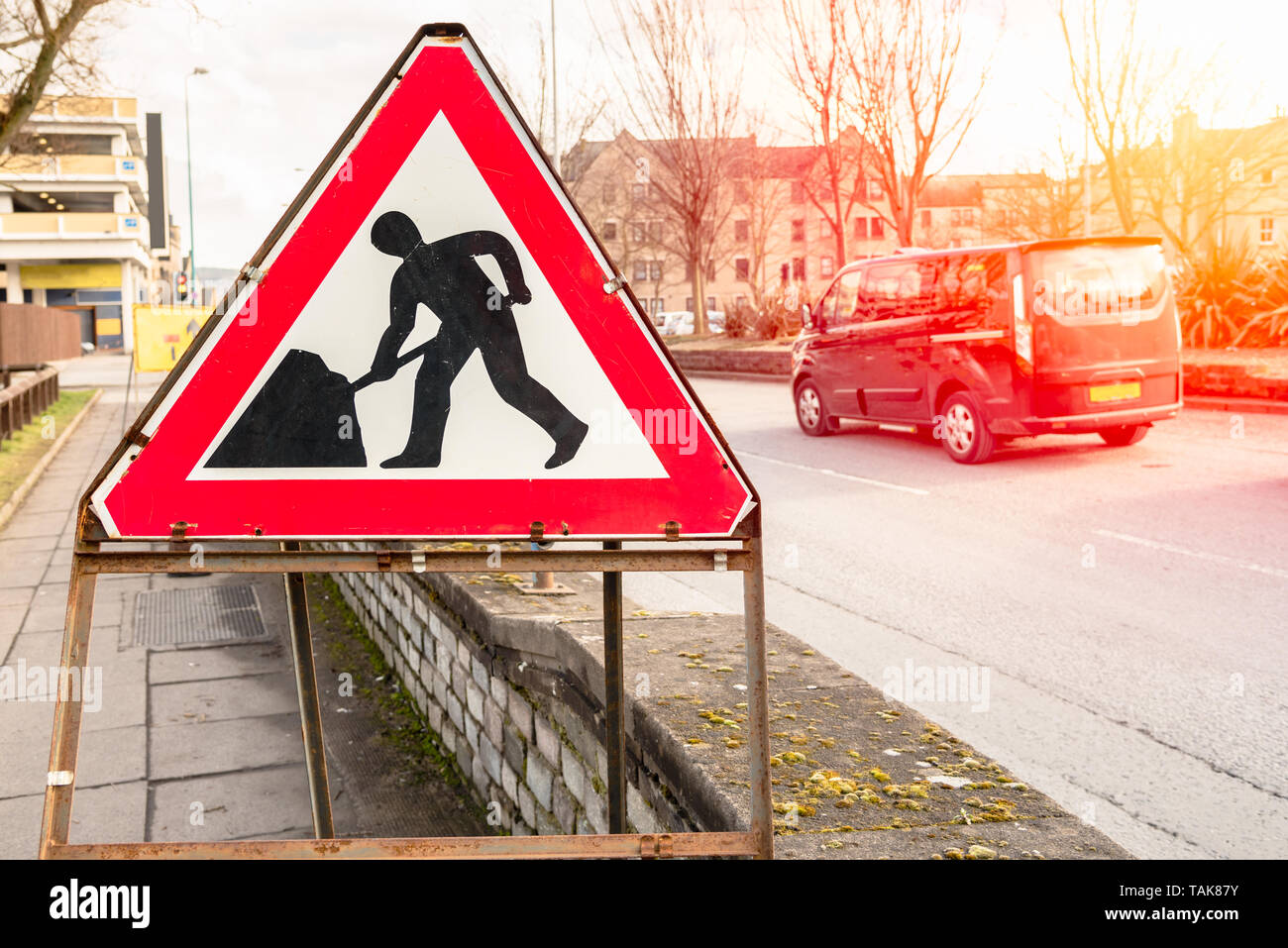 Men at work road sign at the beginning of a construction site along a ...