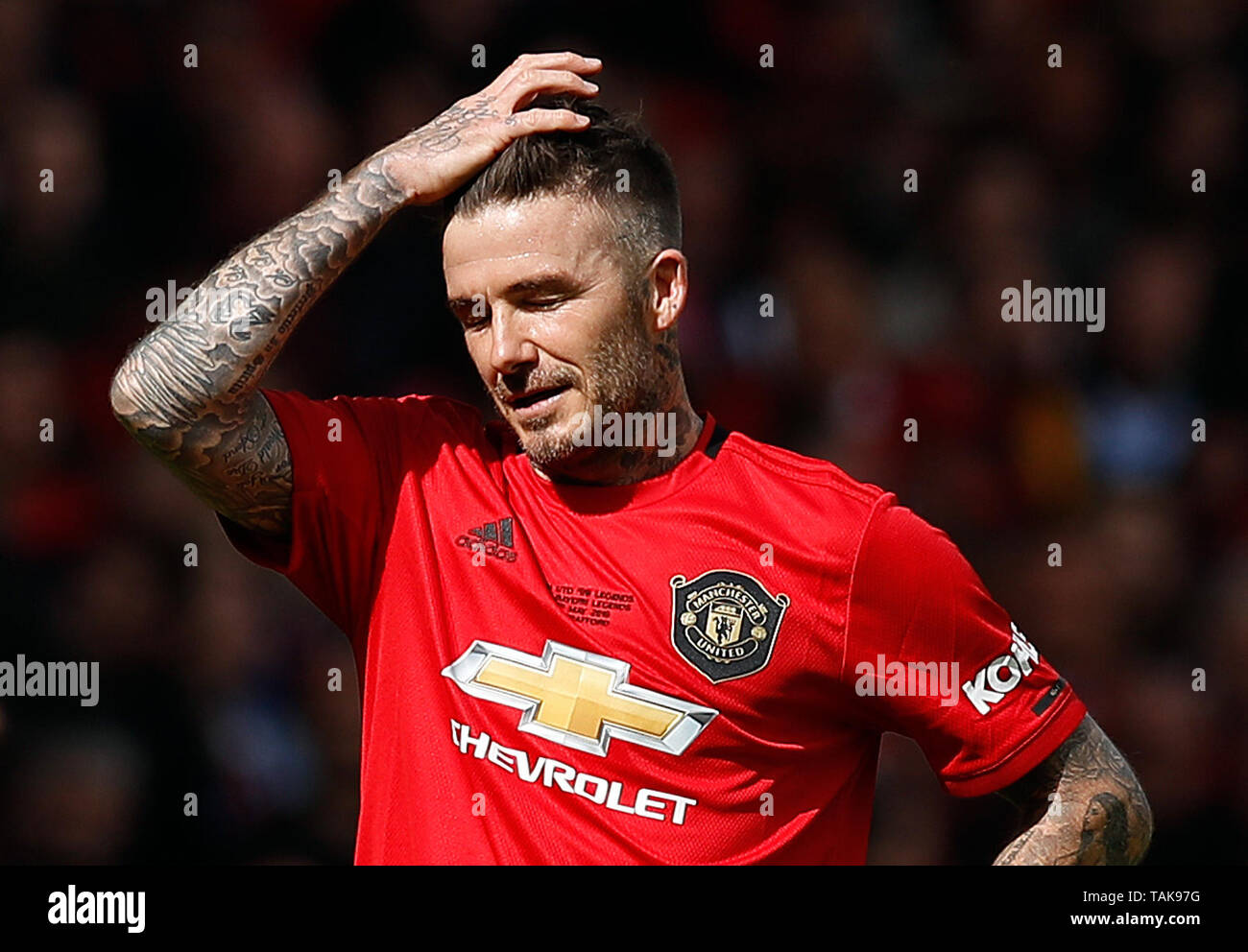 Manchester United Legends David Beckham appears dejected during the ...