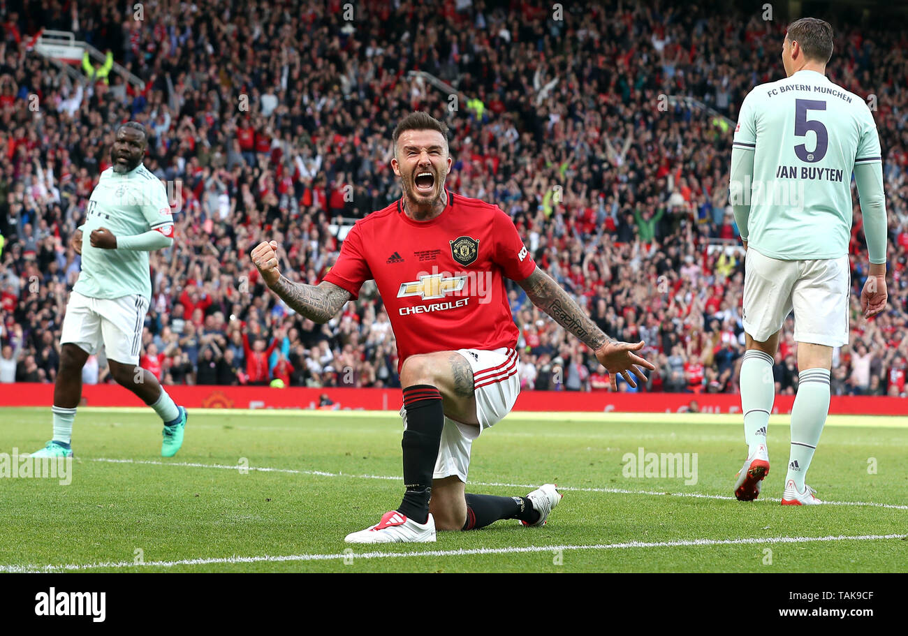 Manchester United Legends David Beckham celebrates scoring his side's ...
