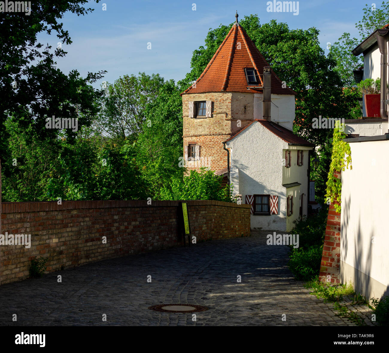 Image of old medieval tower along a stone wall in Germany Stock Photo ...