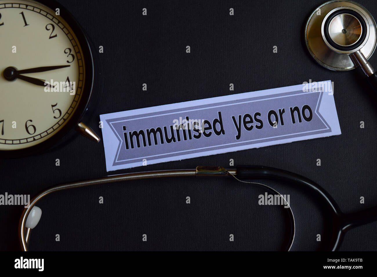 Immunised yes or no on the print paper with Healthcare Concept ...