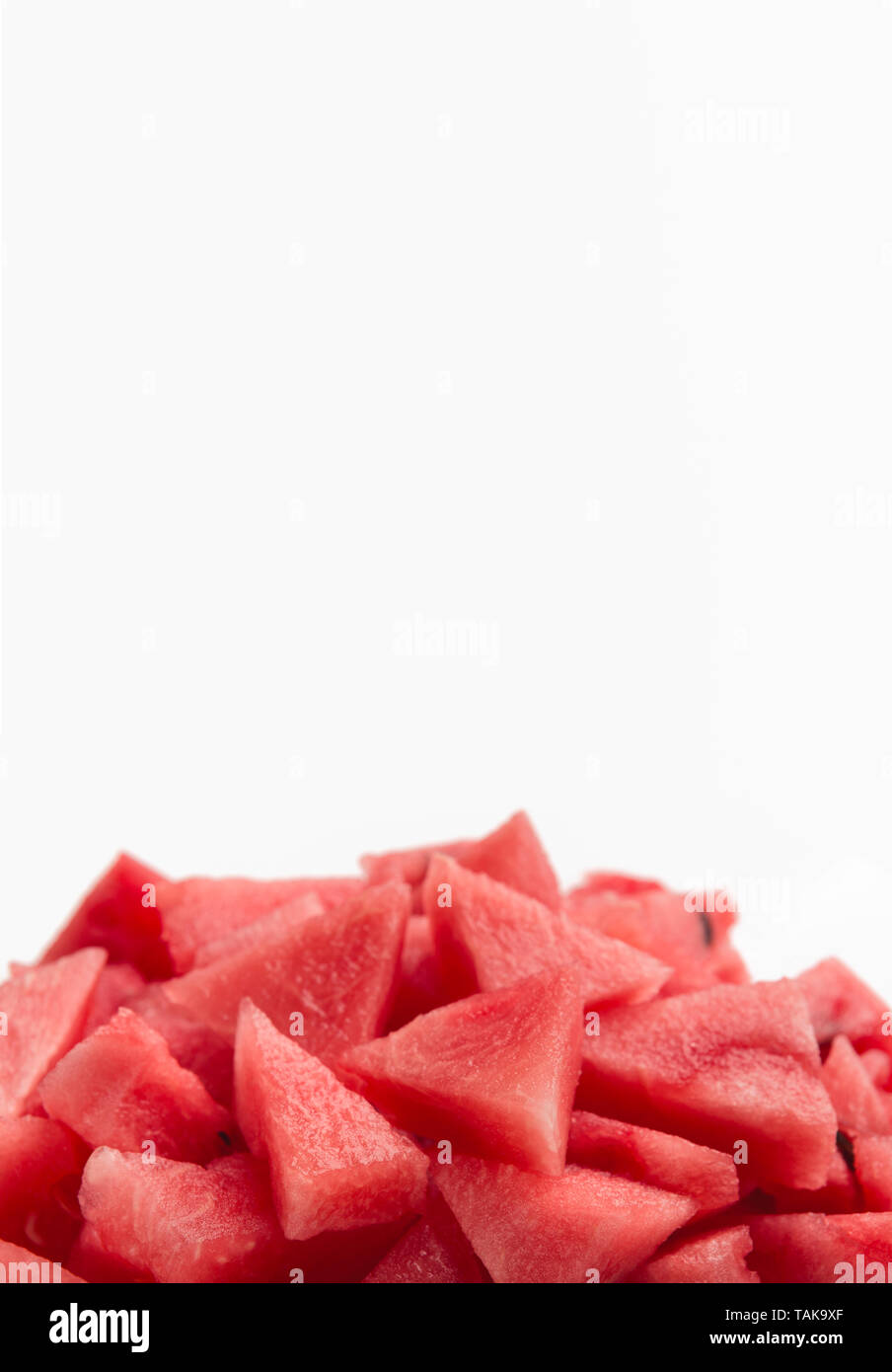 Pile of ripe fresh watermelon pieces, cut into small triangles Stock ...