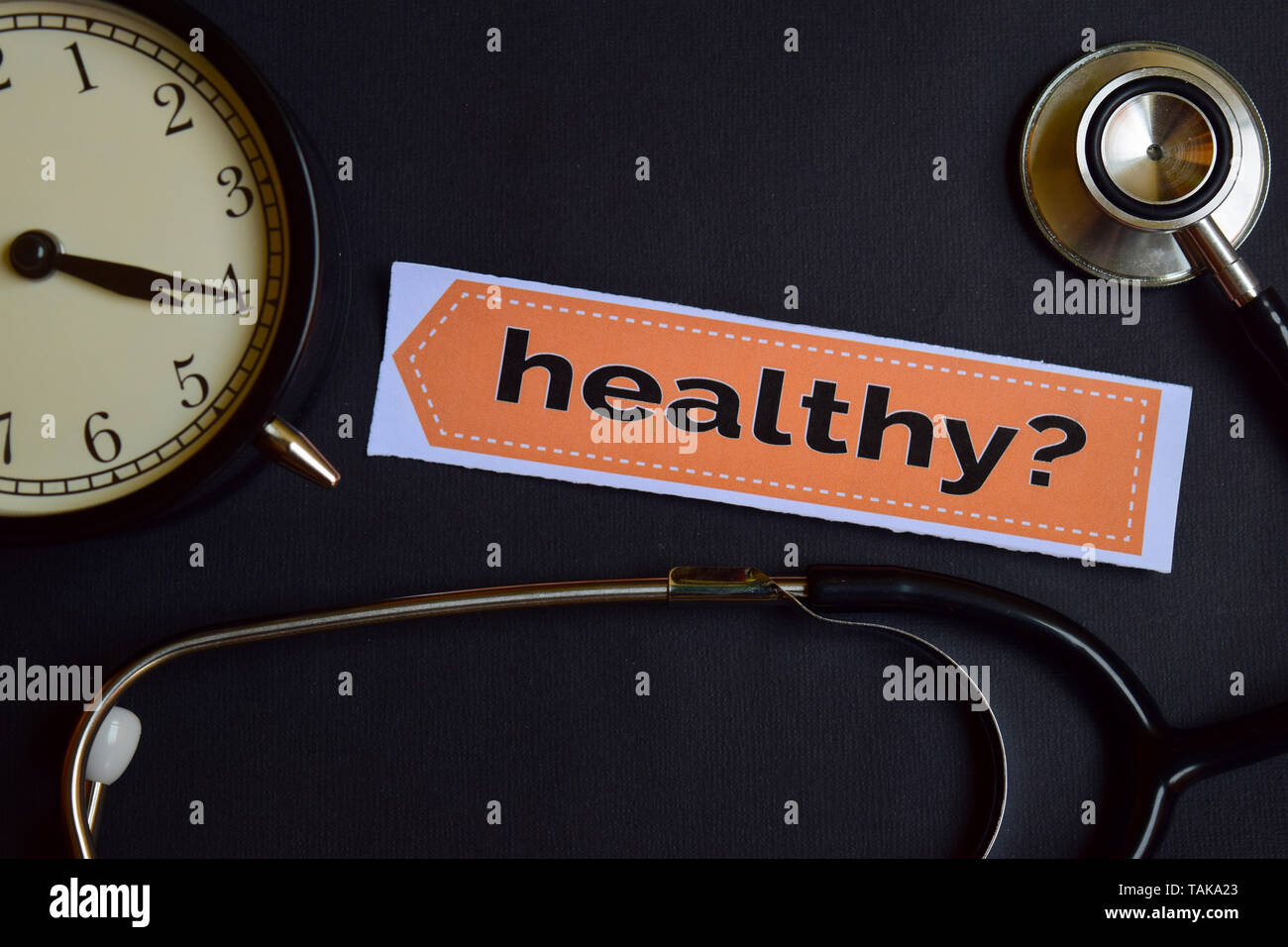 Healthy? on the print paper with Healthcare Concept Inspiration. alarm ...