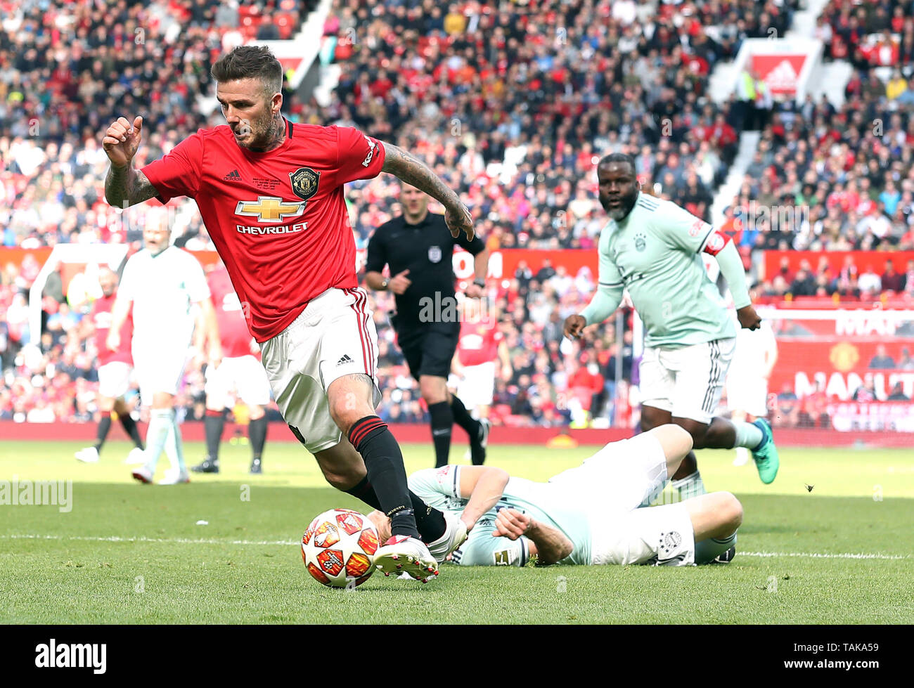 Manchester United Legends David Beckham runs in before scoring his side ...