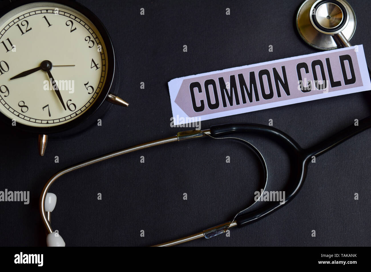 Common Cold on the paper with Healthcare Concept Inspiration. alarm ...