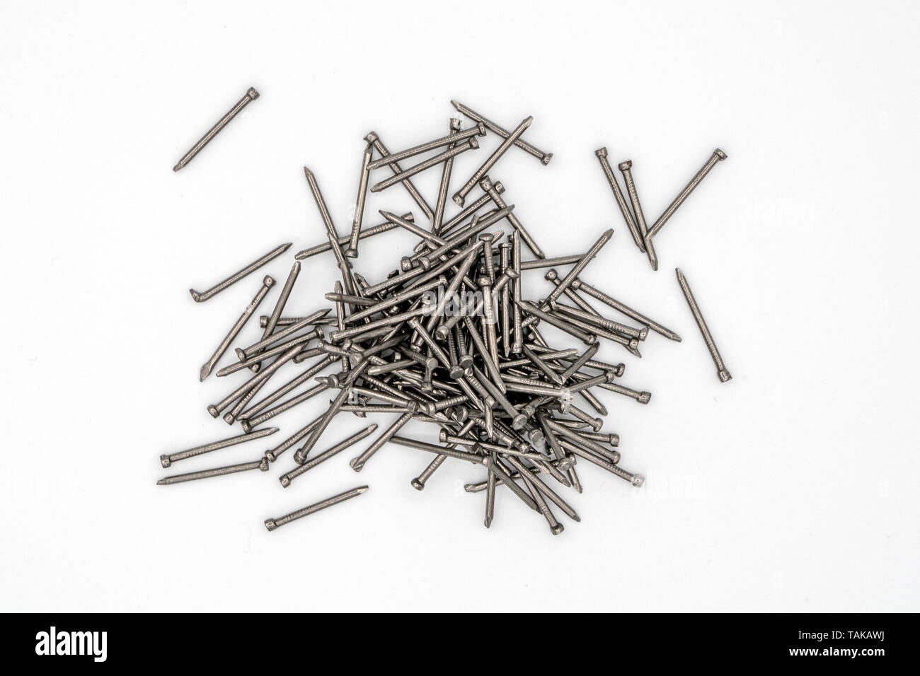 many iron spikes isolated on white lite brite Stock Photo - Alamy