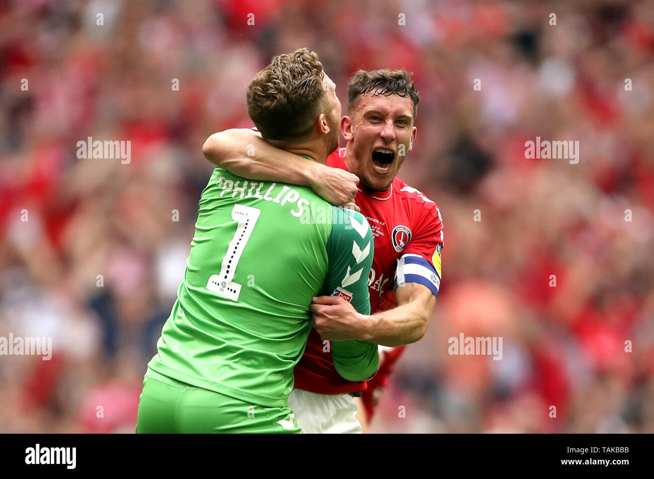 Charlton Athletic's Jason Pearce (right) celebrates the victory with ...