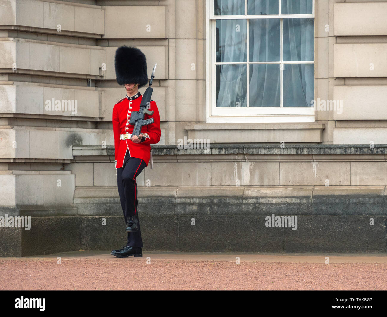 London, UK - April, 2019: English guard patrolling in London. Solider ...